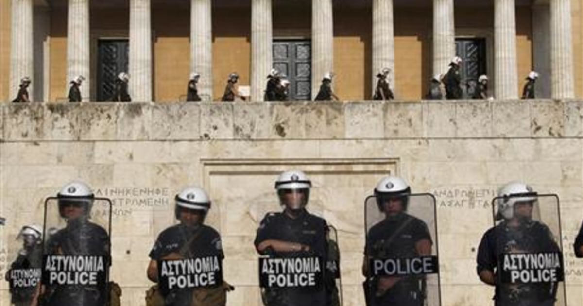 Governments try to calm fears over Greek debt