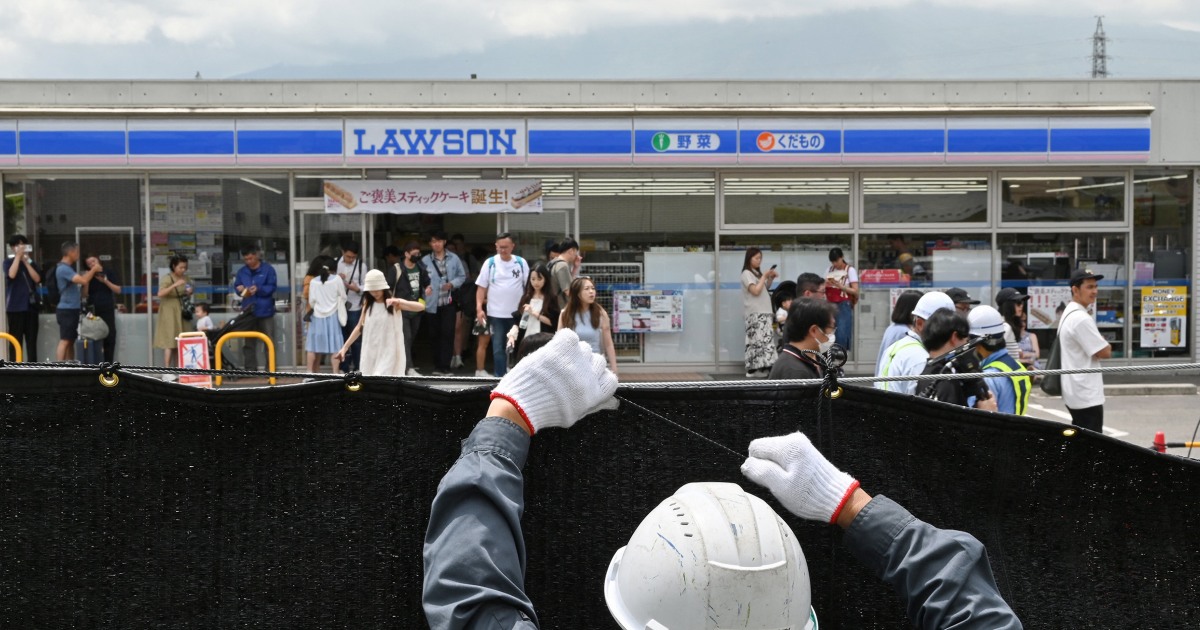 Swarmed with tourists, Japanese town blocks off viral view of Mount Fuji