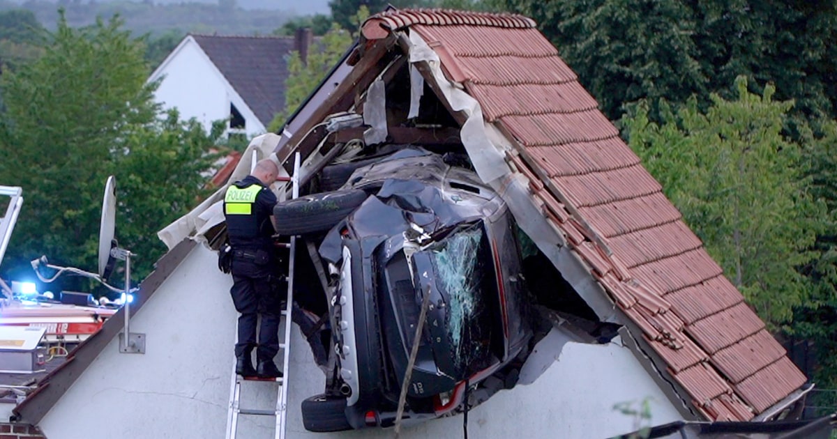 Car crashes into a barn’s roof in Germany, seriously injuring 2