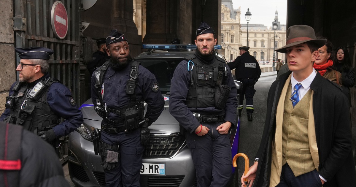 Fedora man unmasked: Meet the teen behind the Louvre mystery photo