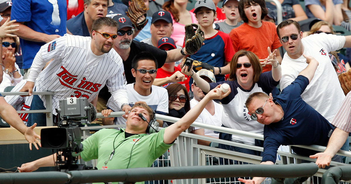 Cameraman keeps his eye on the ball to make the play