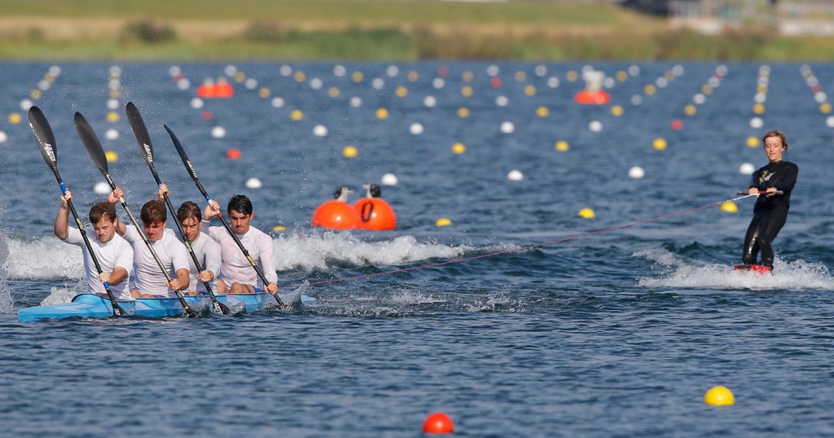Rowers paddle fast enough to pull a wakeboarder
