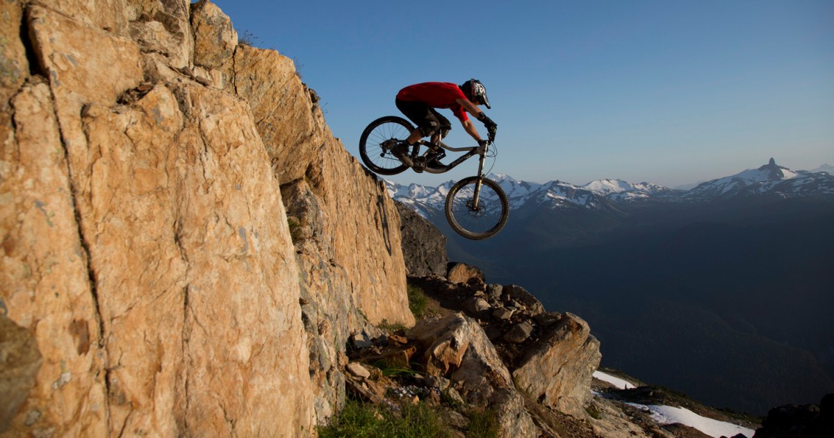 Mountain biker hitting the trail at Whistler Mountain Bike Park