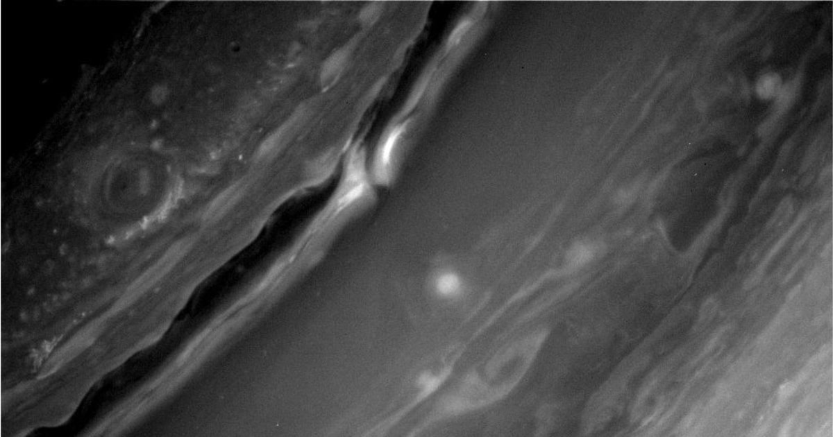 Cassini orbiter sees Saturn's storms in black and white ... and red all ...