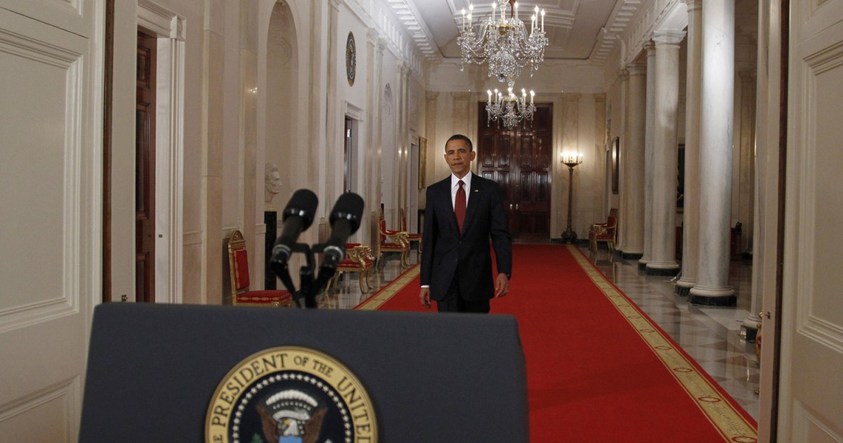 Obama re-enacted the televised address Sunday night for still cameras