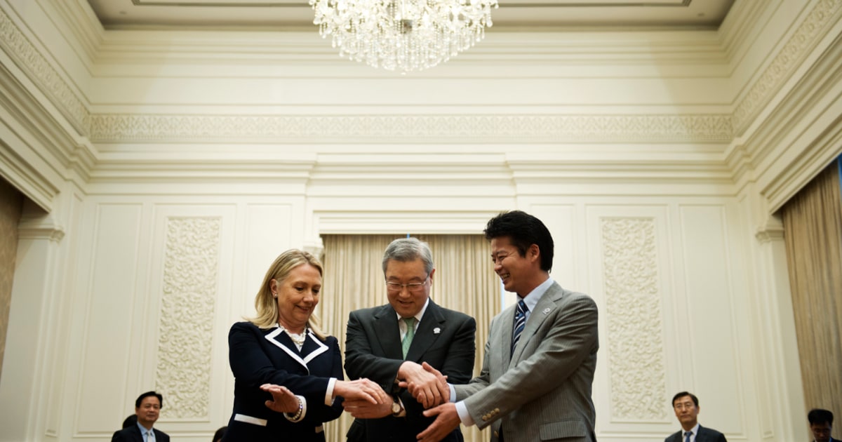 A trilateral handshake ahead of ASEAN meeting