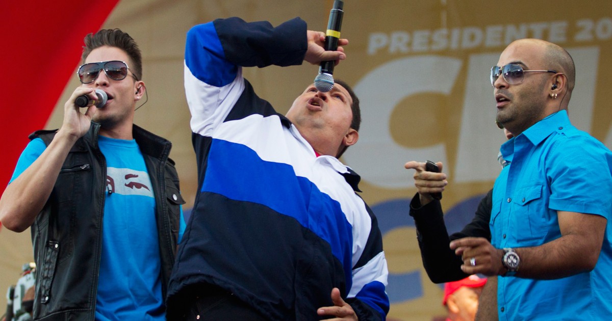 Hugo Chavez sings at election rally