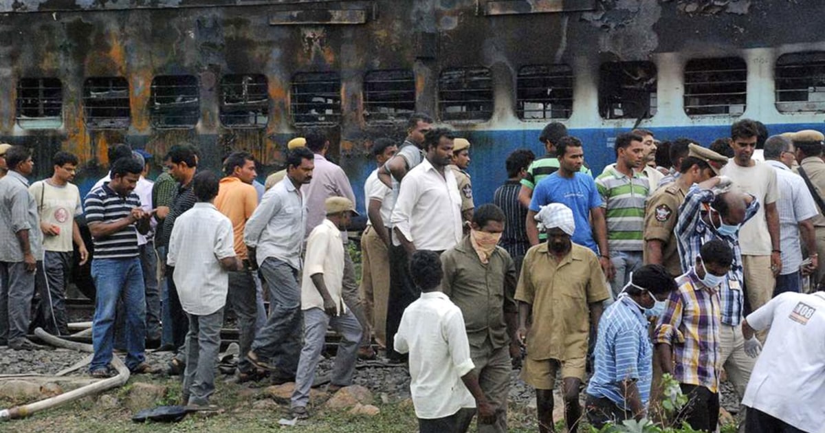 Dozens die as blaze engulfs overnight train in India