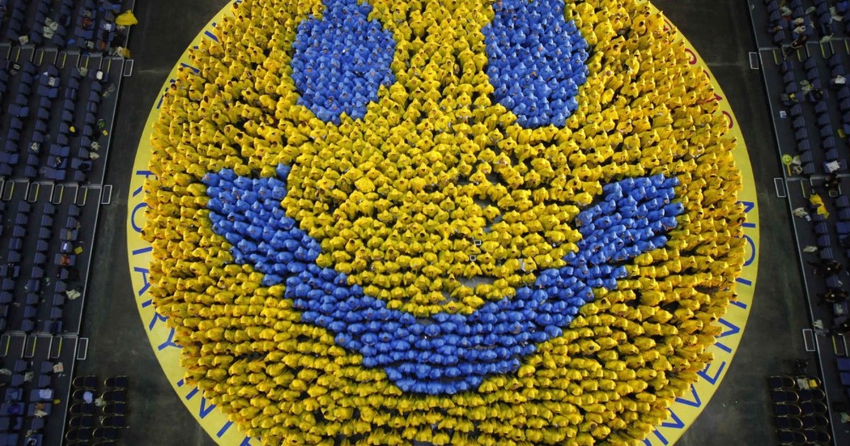 Smiles everyone! World's biggest smiley formed by people in Bangkok
