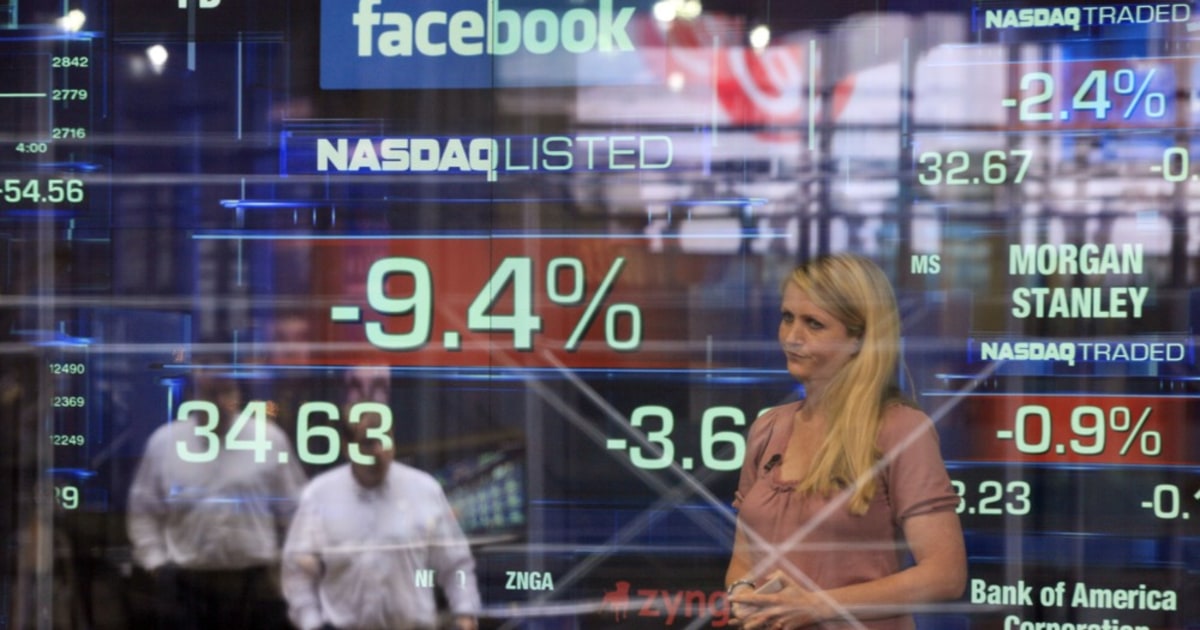 Facebook drops 11 percent as stock market rallies