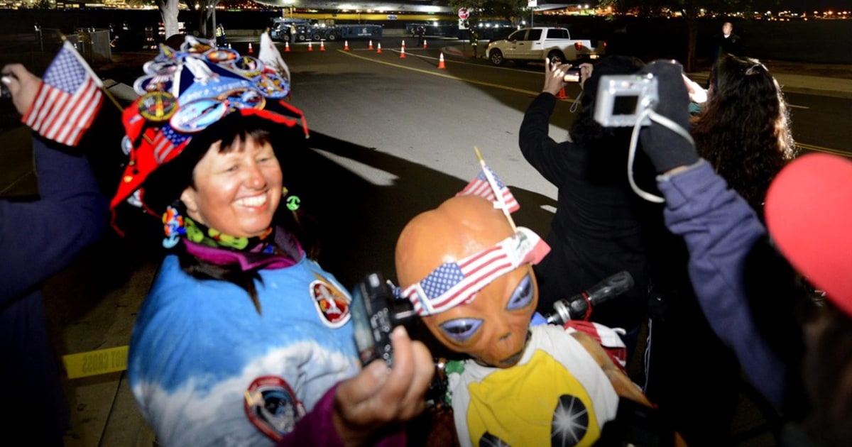 Shuttle fans (and an alien) turn out for Endeavour's final journey