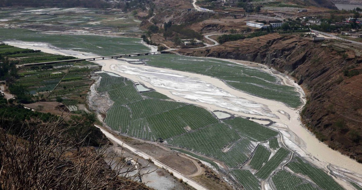 River turns white from pollution in China