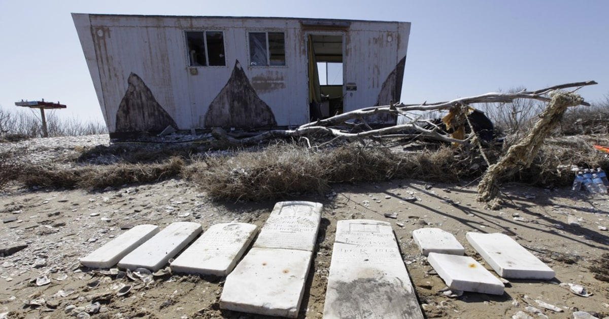 Sea claims graves on a sinking island