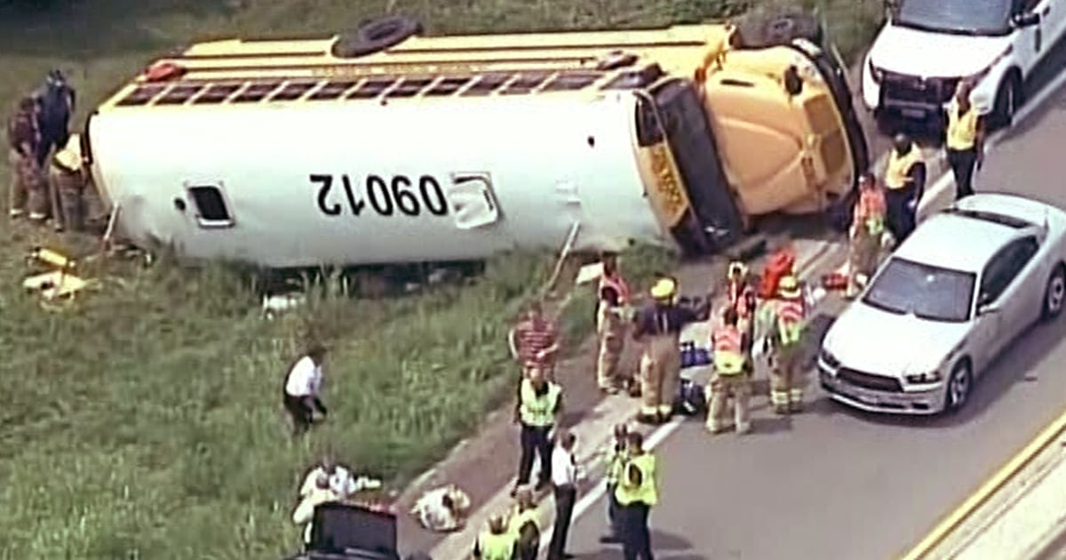 20 injured as bus carrying school kids overturns on Kansas highway ramp