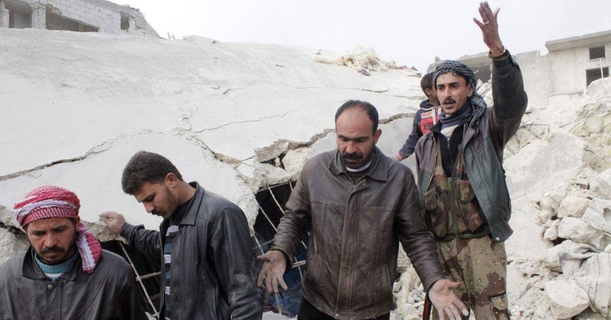 Syrian rocket destroys 3 buildings, kills 20, activists say