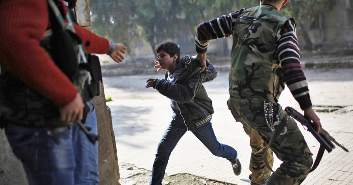 Blasts hit Syrian university, killing dozens
