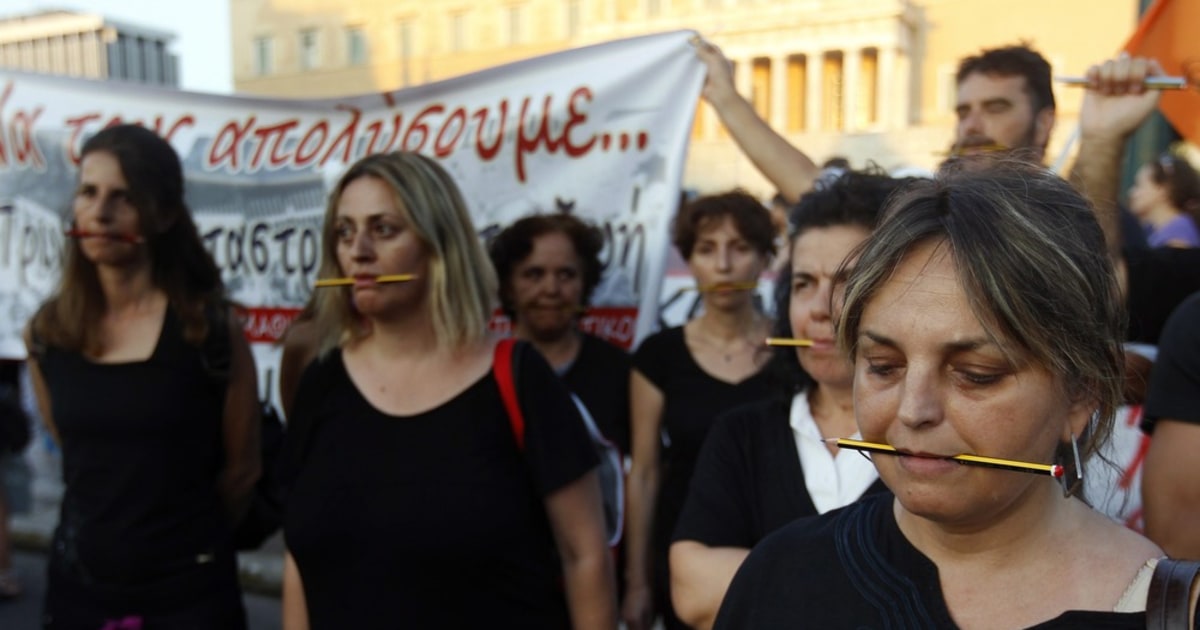Despair as Greek parliament votes to fire thousands of teachers, cops