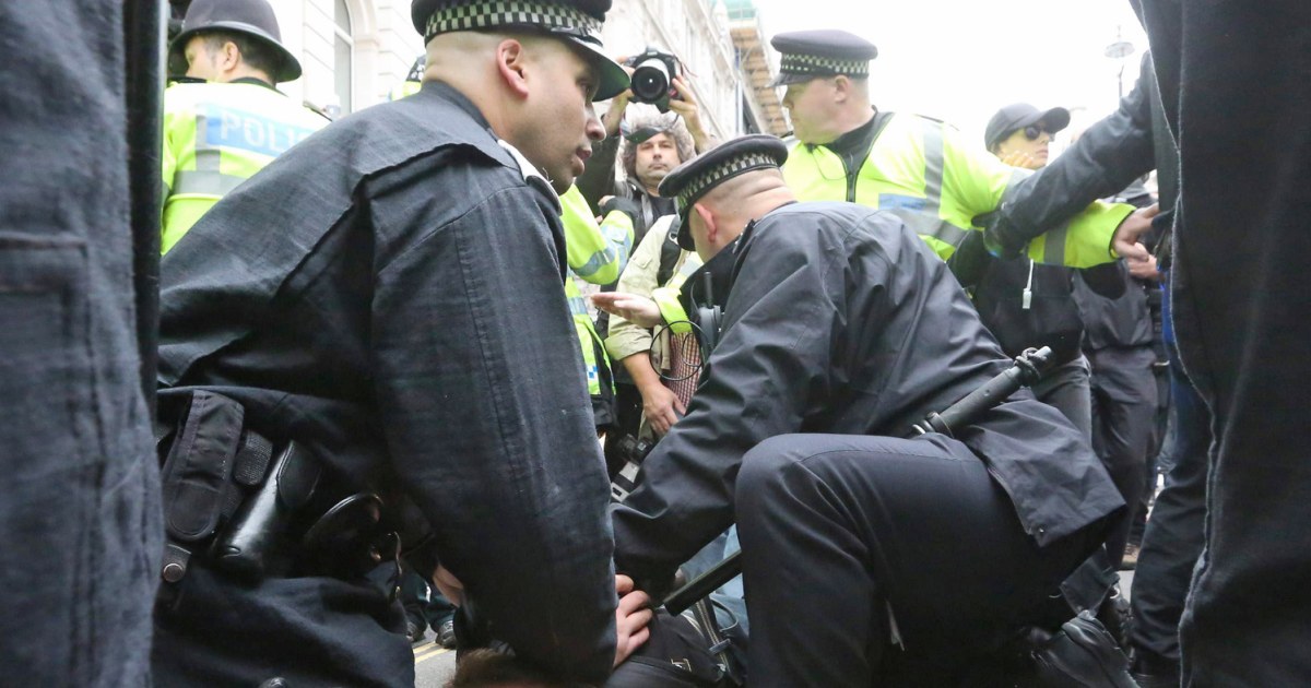 Riot police clash with anti-G8 protesters in London