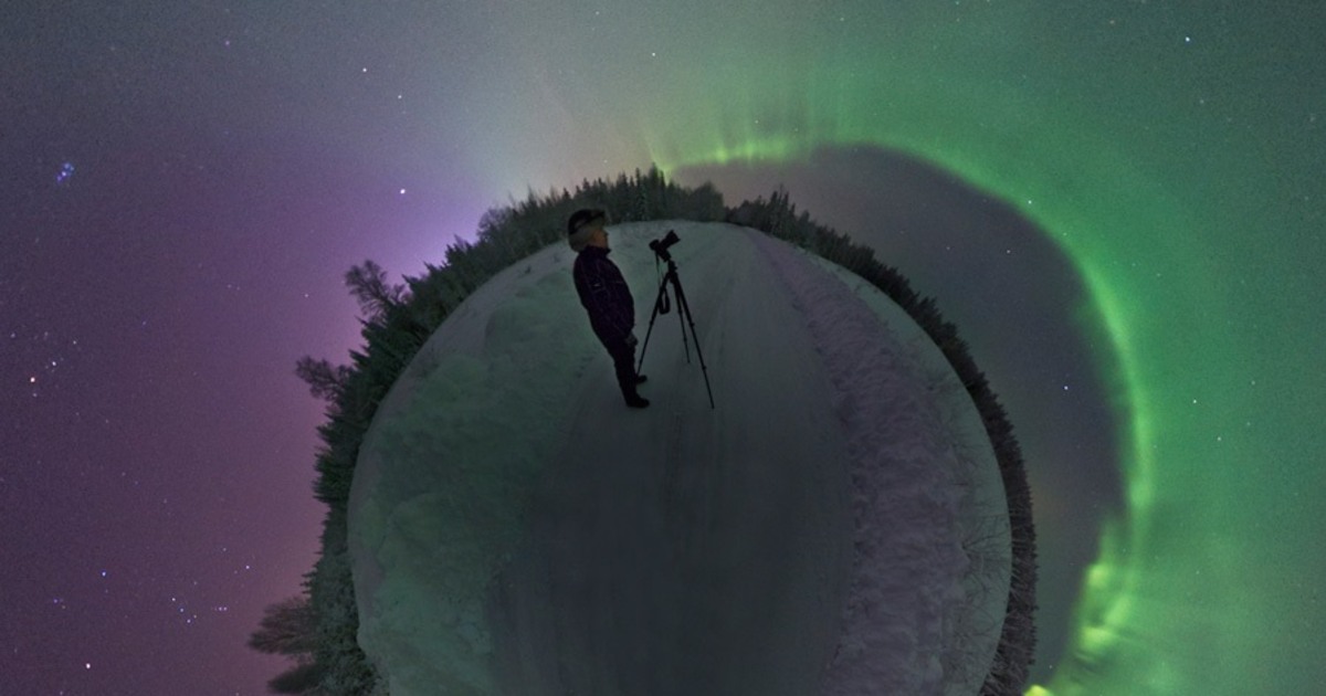 Planet looks back at northern lights
