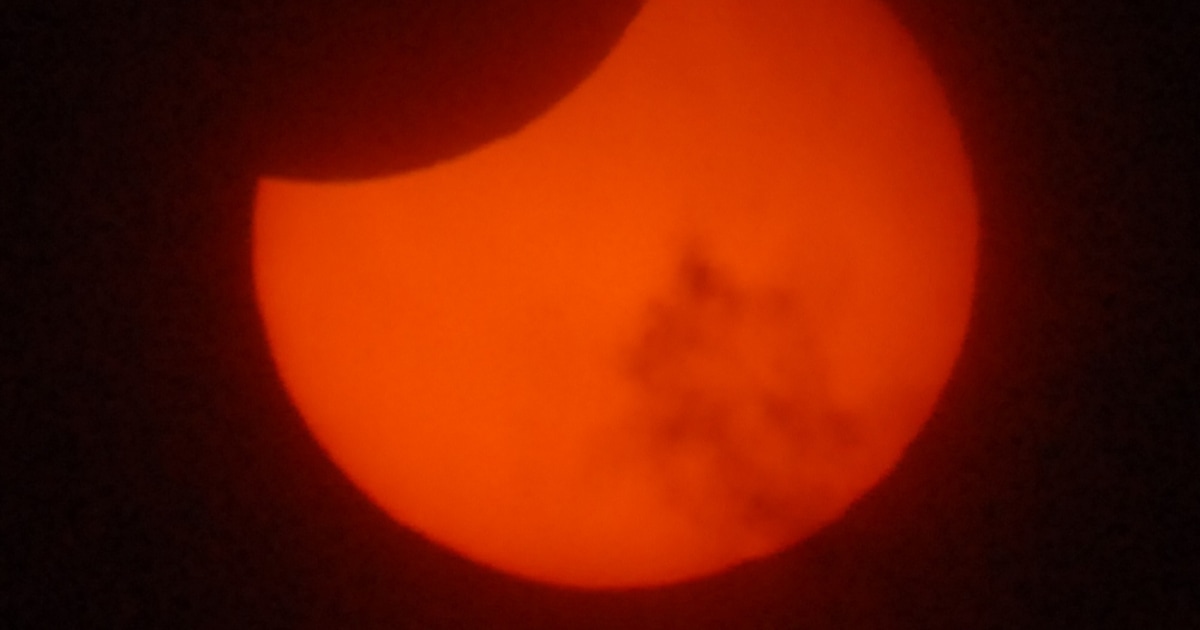 Solar eclipse darkens Black Friday