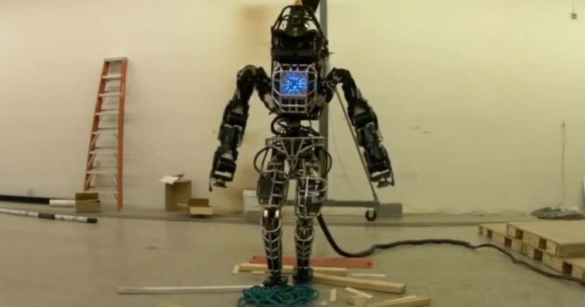 Atlas humanoid robot takes wobbly steps over obstacles