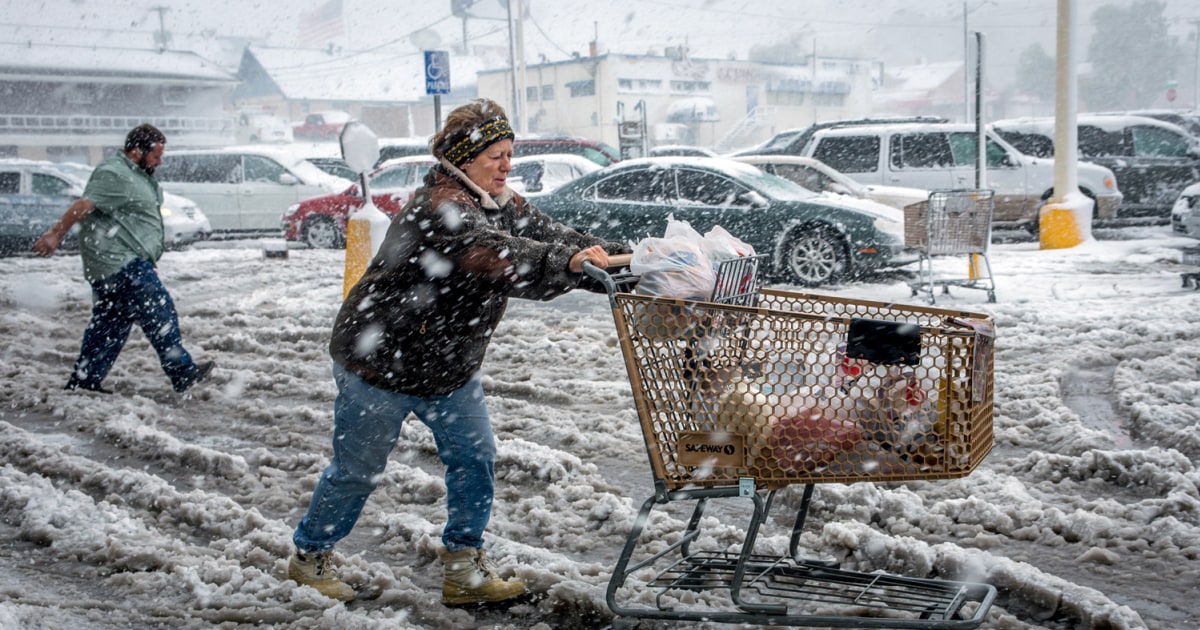 Weather contrasts: Tropical Storm Karen and Winter Storm Atlas