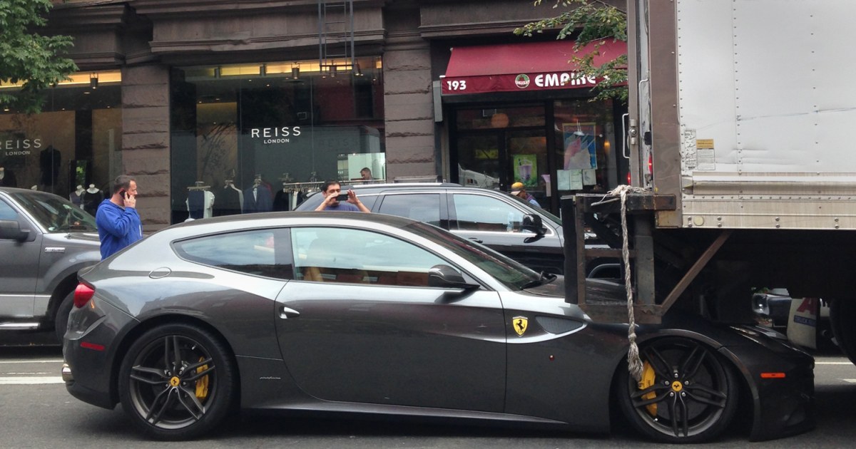 $300k Ferrari run over by delivery truck backing up