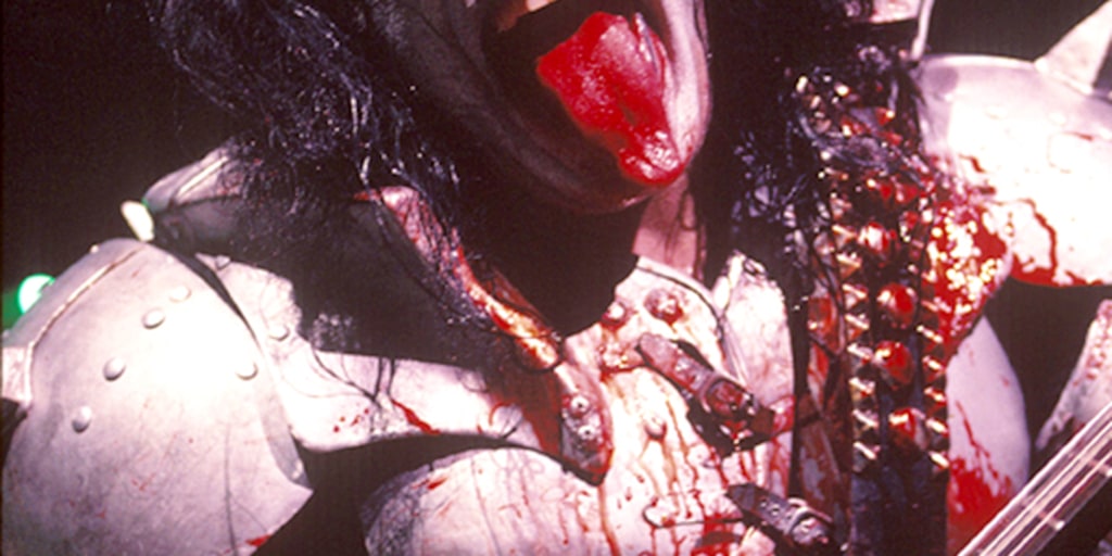 gene simmons spitting blood 1976
