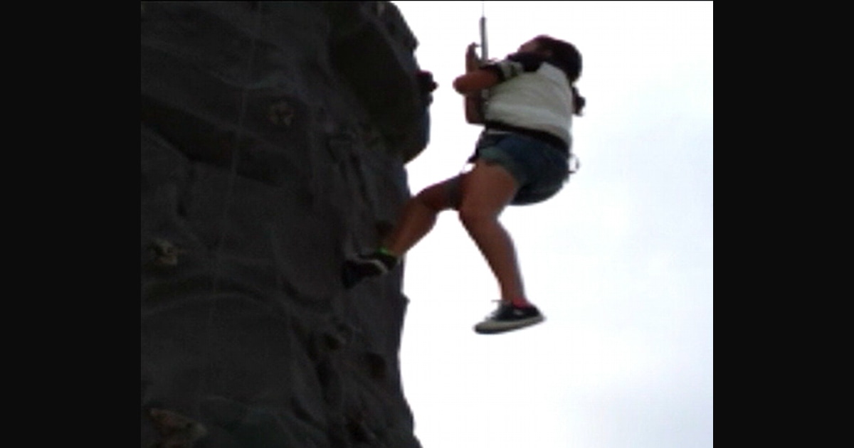 Caught on tape: Girl falls 18 feet from rock wall