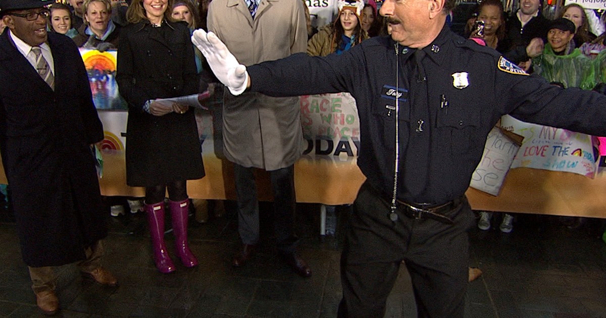 Dancing cop shows off his signature moves