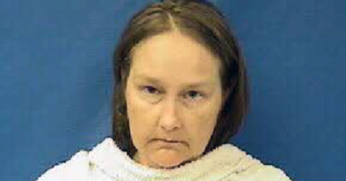 Wife of former official arrested in Texas DA murders
