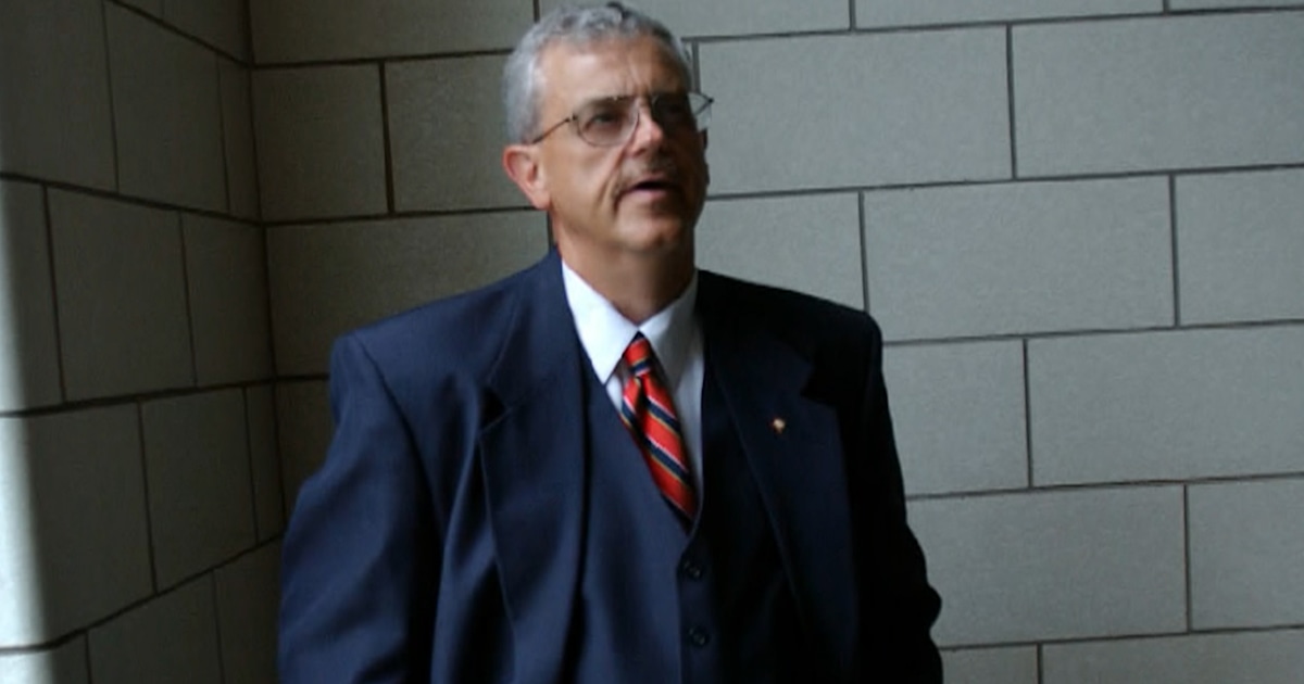 Judge charged with intimidating romantic rival