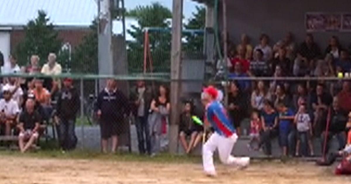 Watch this softball player hit a home run – backwards!
