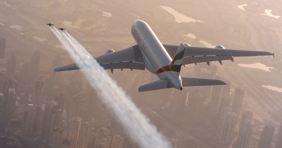 Watch daredevils with jetpacks chase a jumbo jet