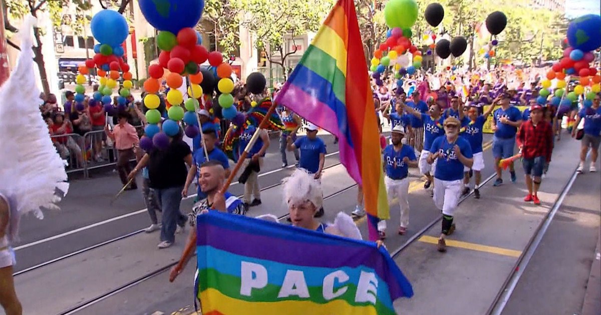 Gay Pride parades draw record crowds, heavy police presence