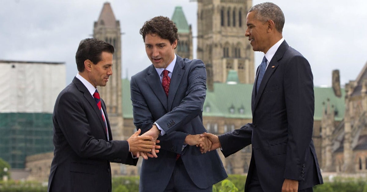 Watch this awkward three-way handshake with Obama