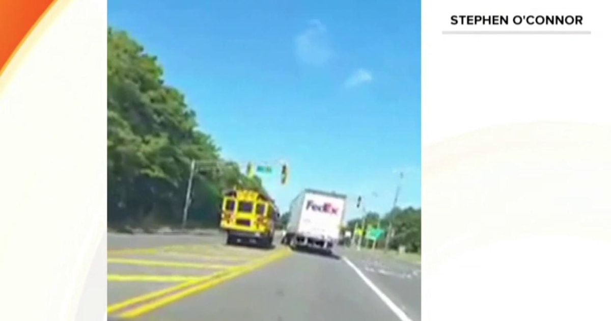 School bus driver fired after video shows him swerving into wrong lane