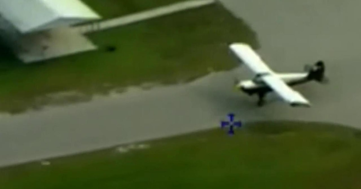 Plane crash-lands onto driving course, skids into fence after losing power