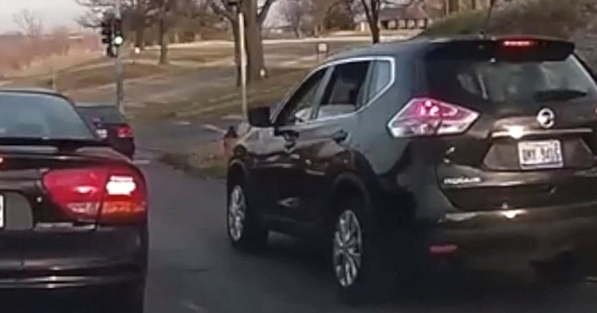 Caught on video: Drive-by shooter sprays car with bullets