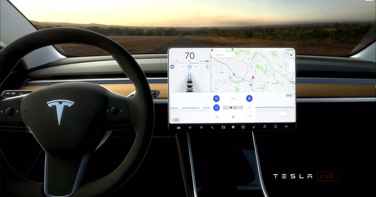 Tesla rolls out first Model 3 electric cars for $35,000