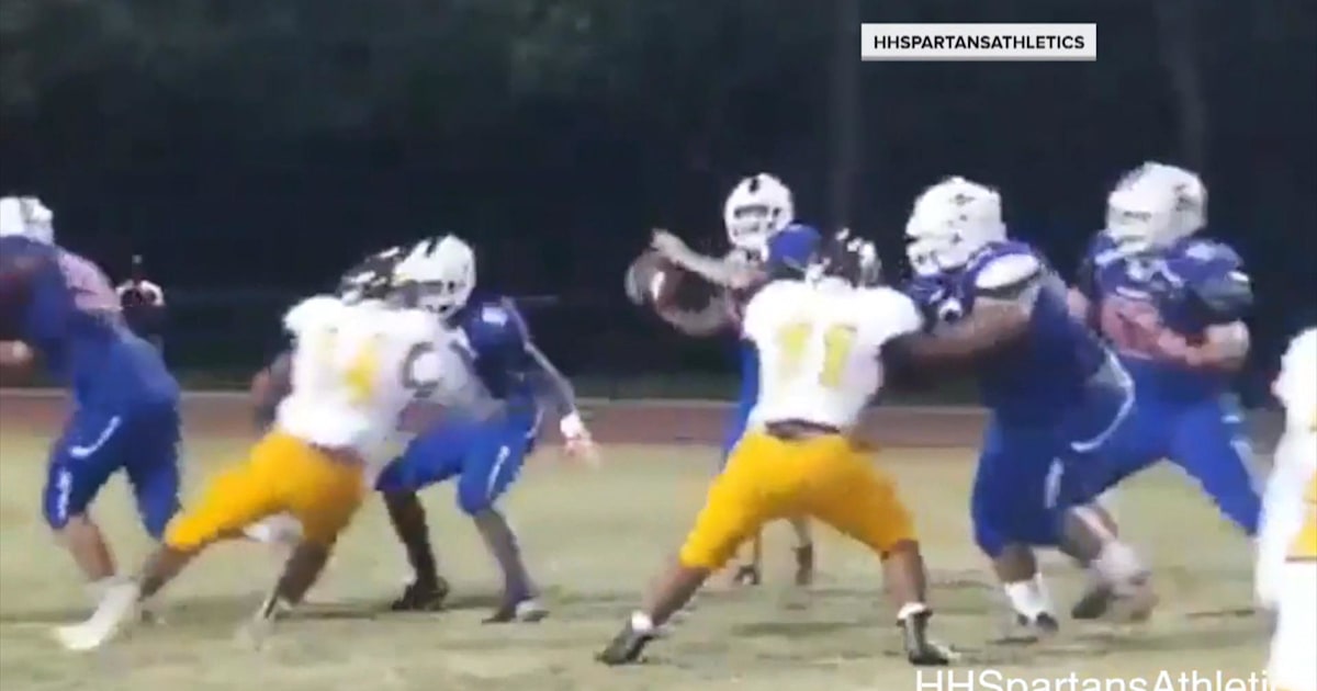Watch high school quarterback throw for a touchdown on her first pass