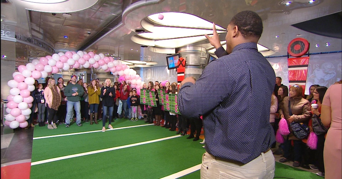 Football player Devon Still completes the final pass to tackle cancer