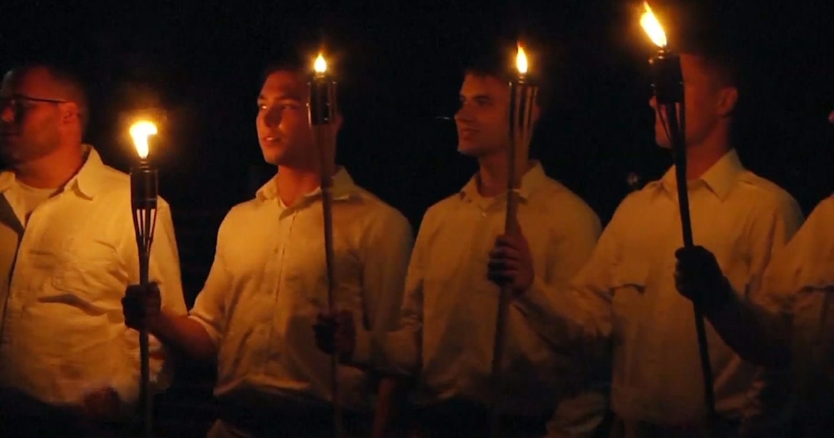 White nationalists carrying torches march in Charlottesville