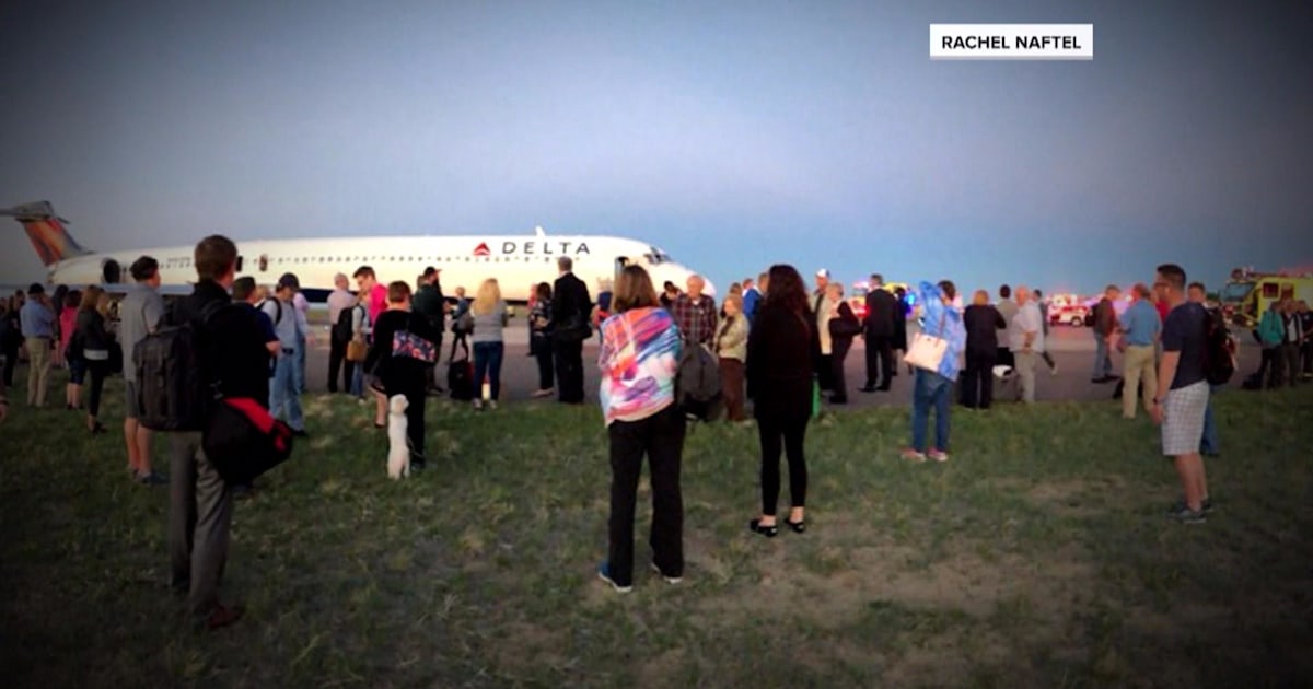 Delta flight evacuated after smoke reported on plane