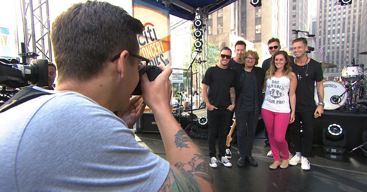 Watch a lucky fan pose for a fun photo with OneRepublic!