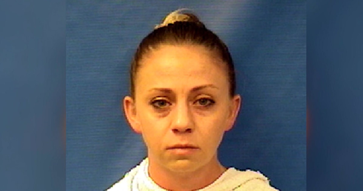 Dallas officer Amber Guyger who shot neighbor is arrested, charged