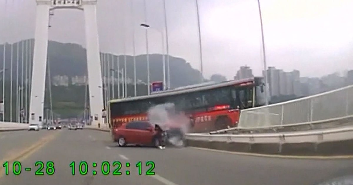 Dramatic video shows Chinese bus plunging off bridge after altercation