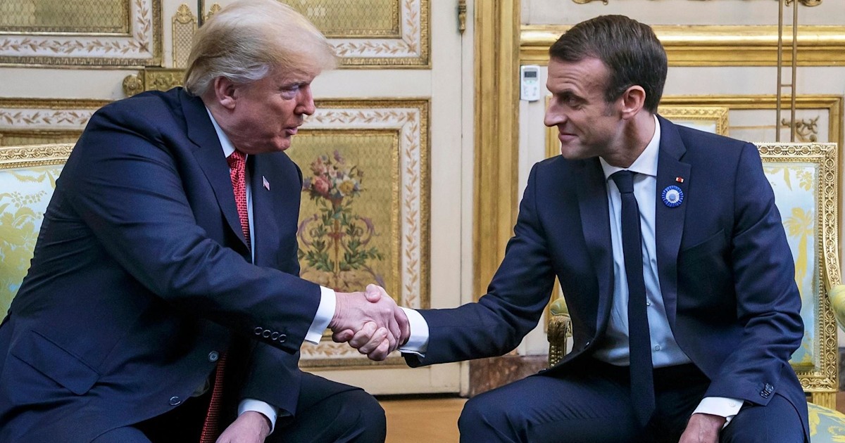 Trump attacks Macron upon landing in France