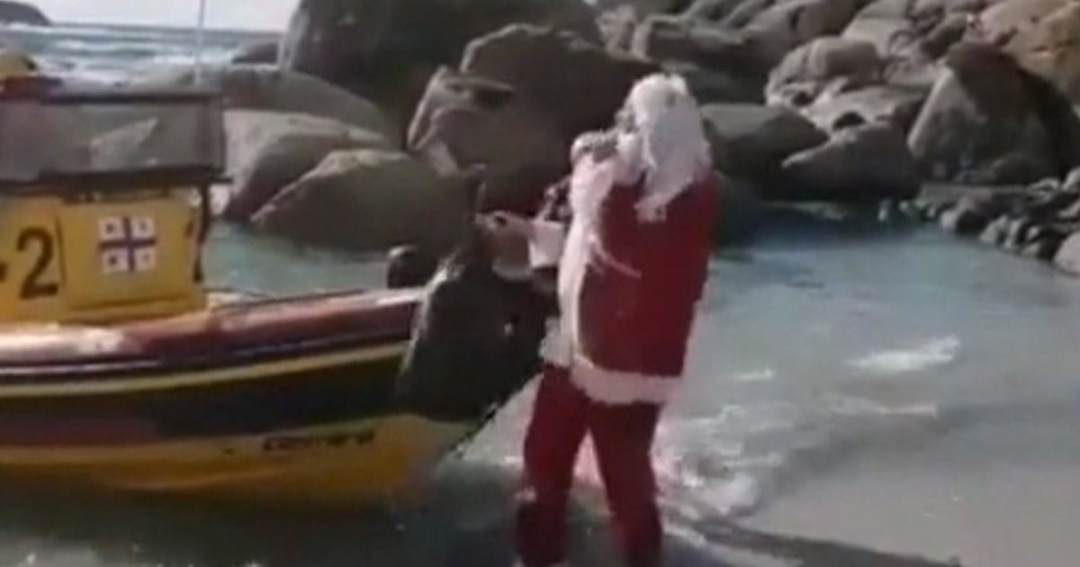 Watch: Clumsy Santa Claus falls over boat when delivering gifts