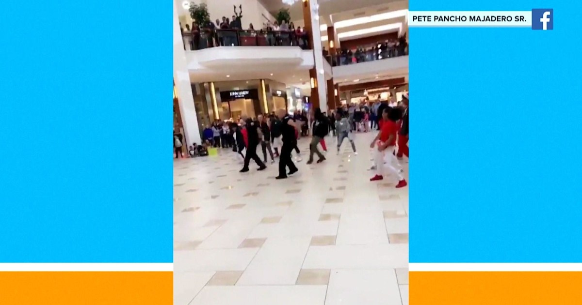 Watch: Police officers break up dance party with their own flash mob
